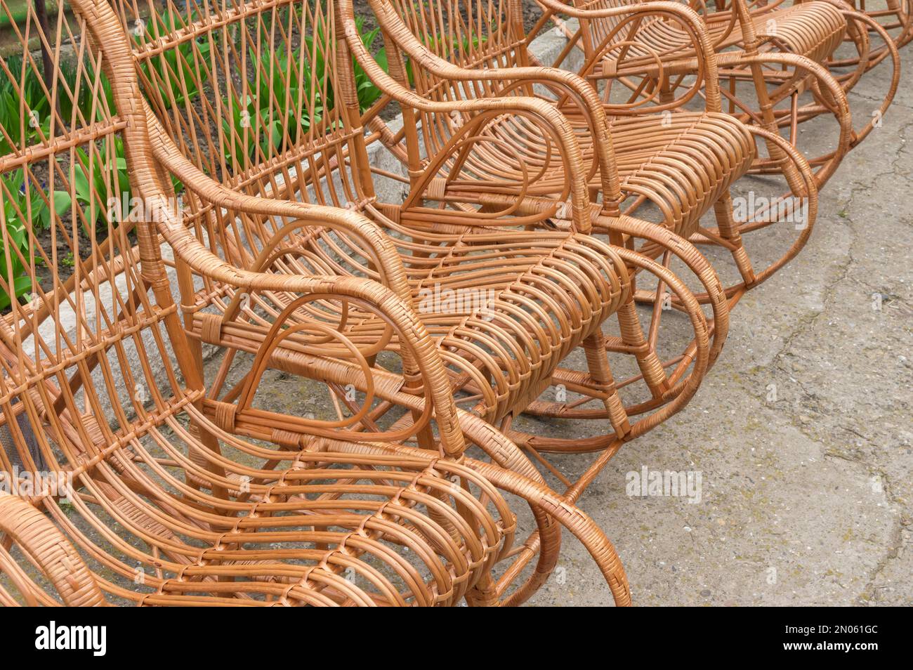 rocking chairs standing made with withe staning on rough surface in ...