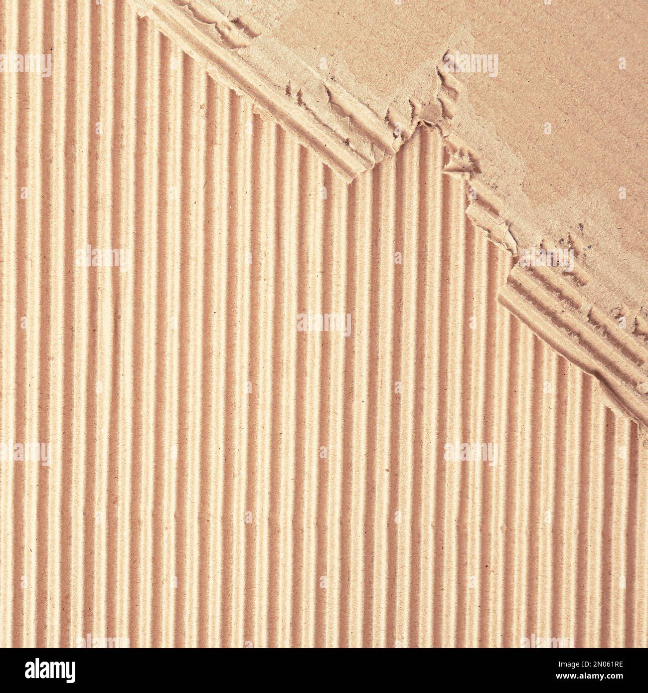 Wall paper design. Brown corrugated sheet of cardboard as background ...