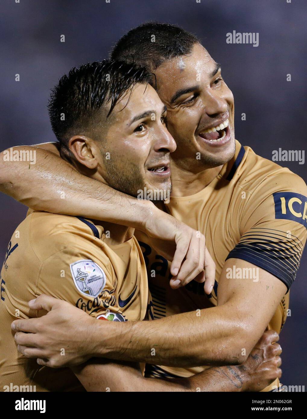 Ismael Sosa, of Mexico’s Pumas, left, celebrates with teammate Javier ...