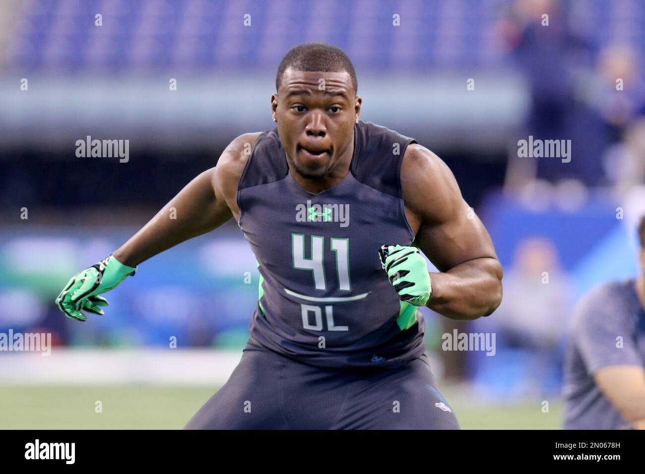Virginia Tech defensive lineman Dadi Nicolas performs a drill at the ...