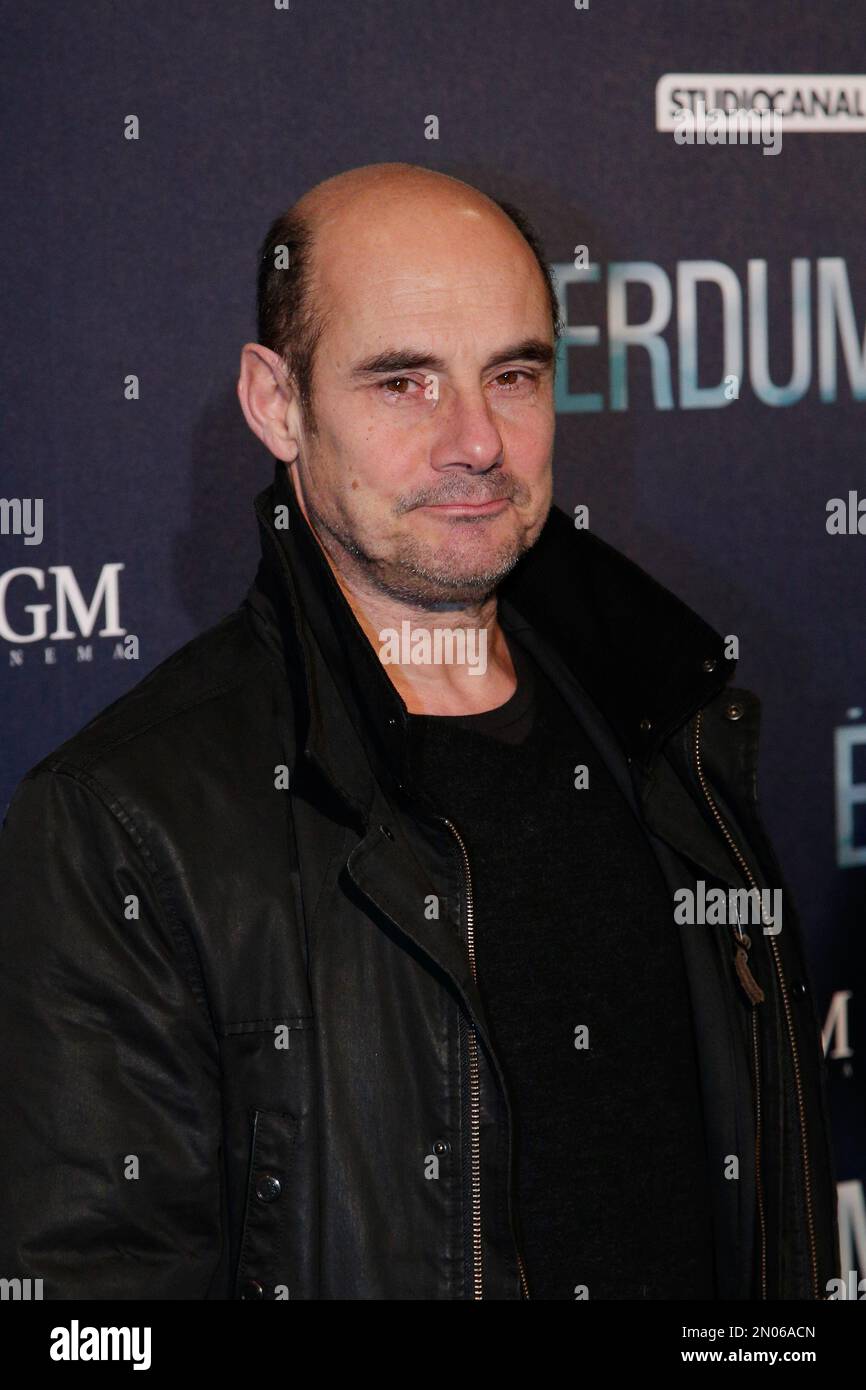 French actor Bernard Campan poses for photographers as he arrives at ...
