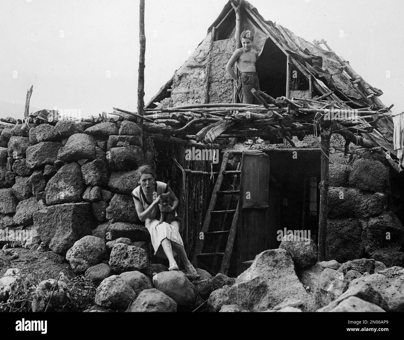 Margaret Wittmer, seated and her 14 -year-old blind stepson Harry ...