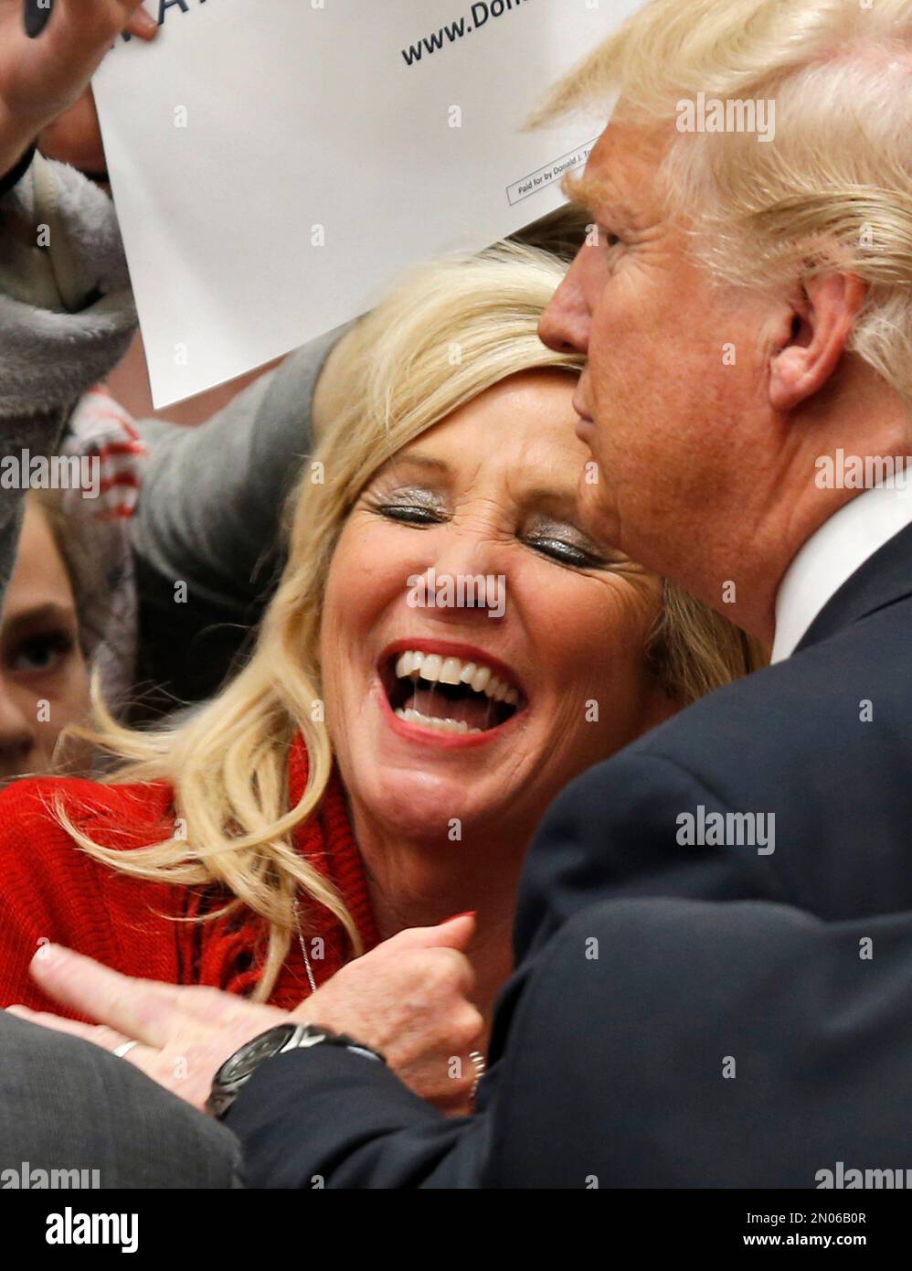 A supporter of Republican presidential candidate, Donald Trump reacts ...