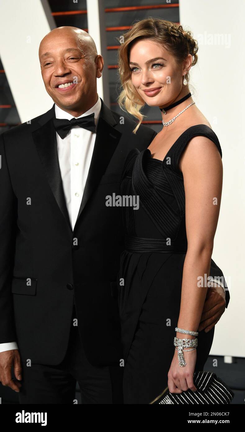 Russell Simmons, left, and Lucy McIntosh arrives at the Vanity Fair ...