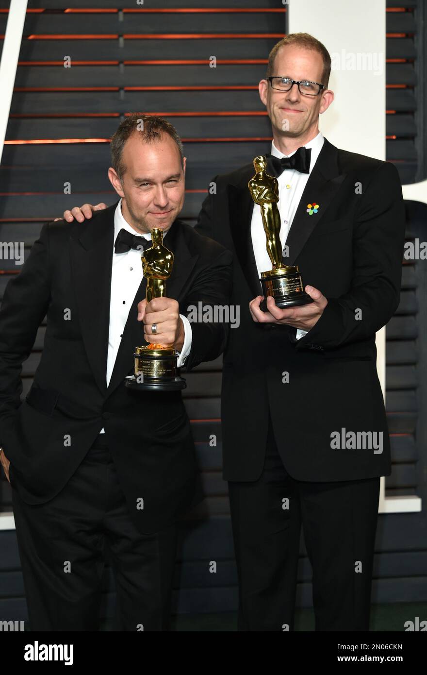 Jonas Rivera, left, and Pete Docter arrive at the Vanity Fair Oscar ...
