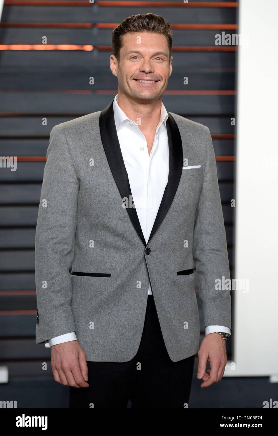 Ryan Seacrest arrives at the Vanity Fair Oscar Party on Sunday, Feb. 28 ...