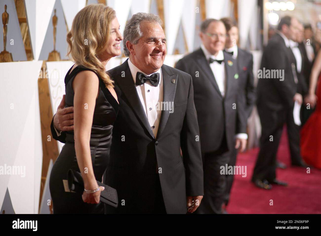 Ann Gianopulos, left, and Jim Gianopulos arrive at the Oscars on Sunday ...