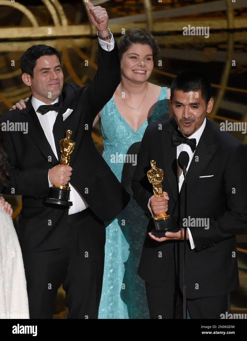 Pato Escala, from left, Antonia Herrera, and Gabriel Osorio accept the award for best animated ...