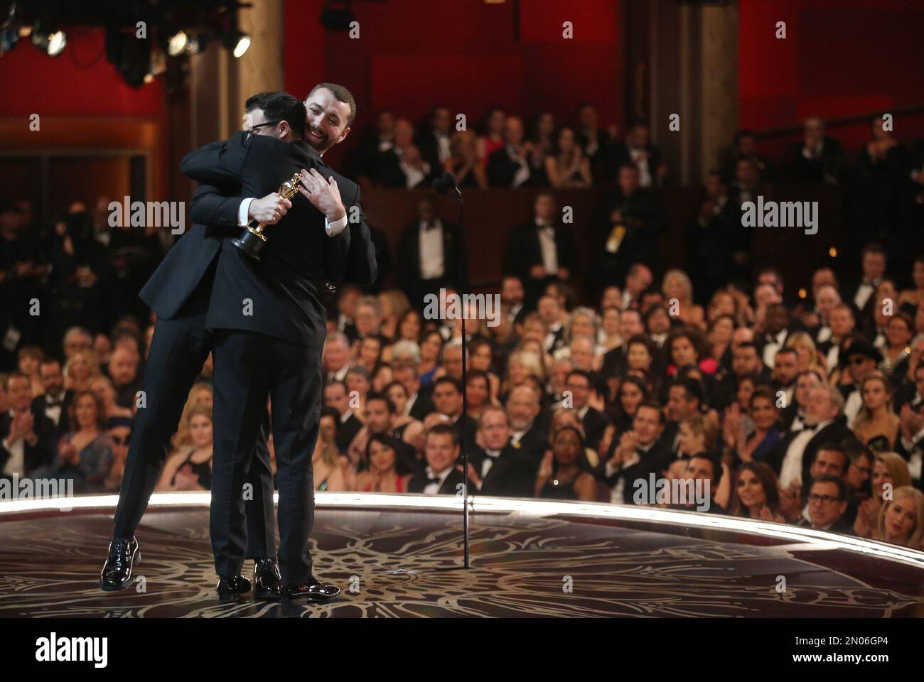Jimmy Napes, left, and Sam Smith embrace as they accept the award for ...