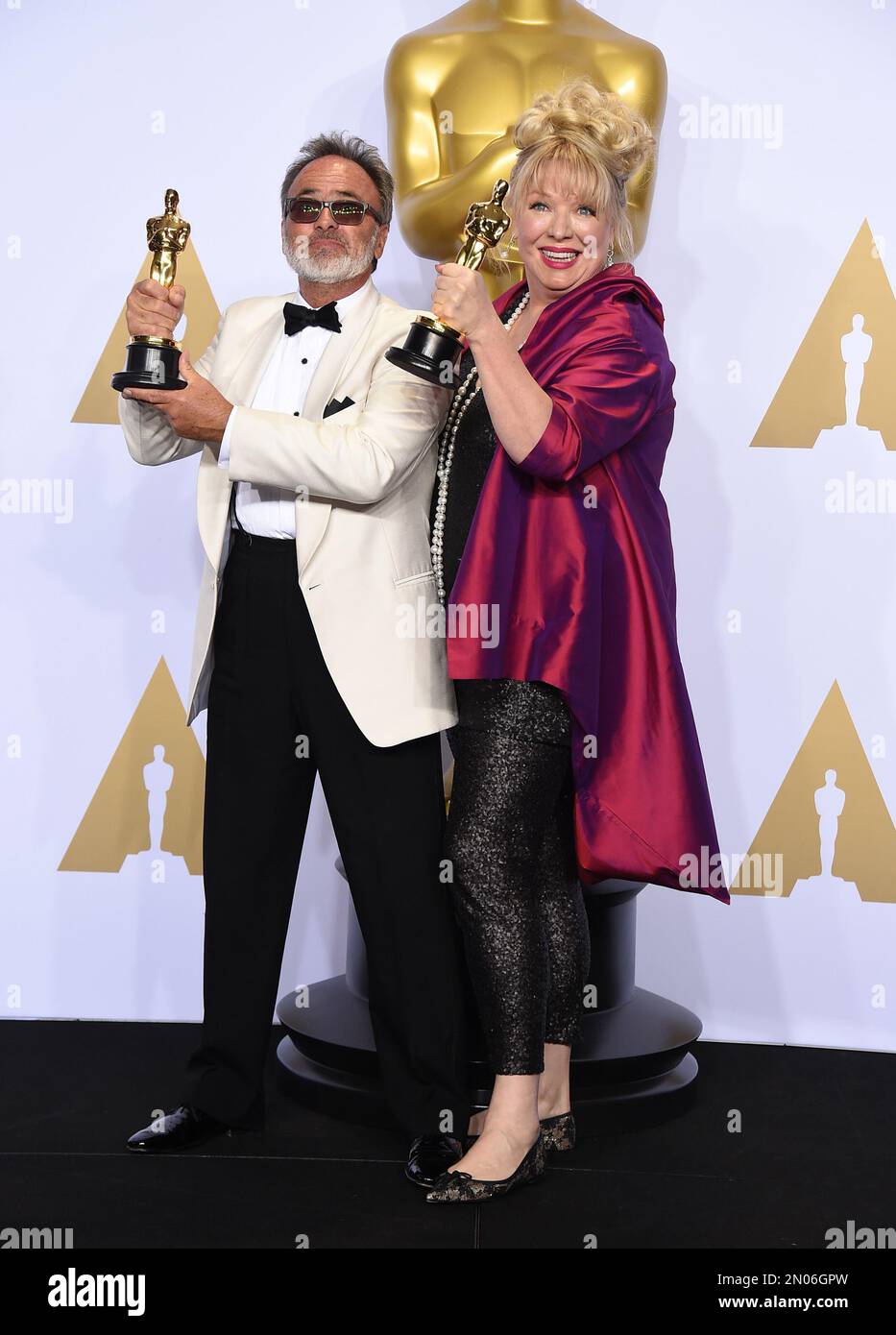 Colin Gibson, left, and Lisa Thompson pose with the award for best ...