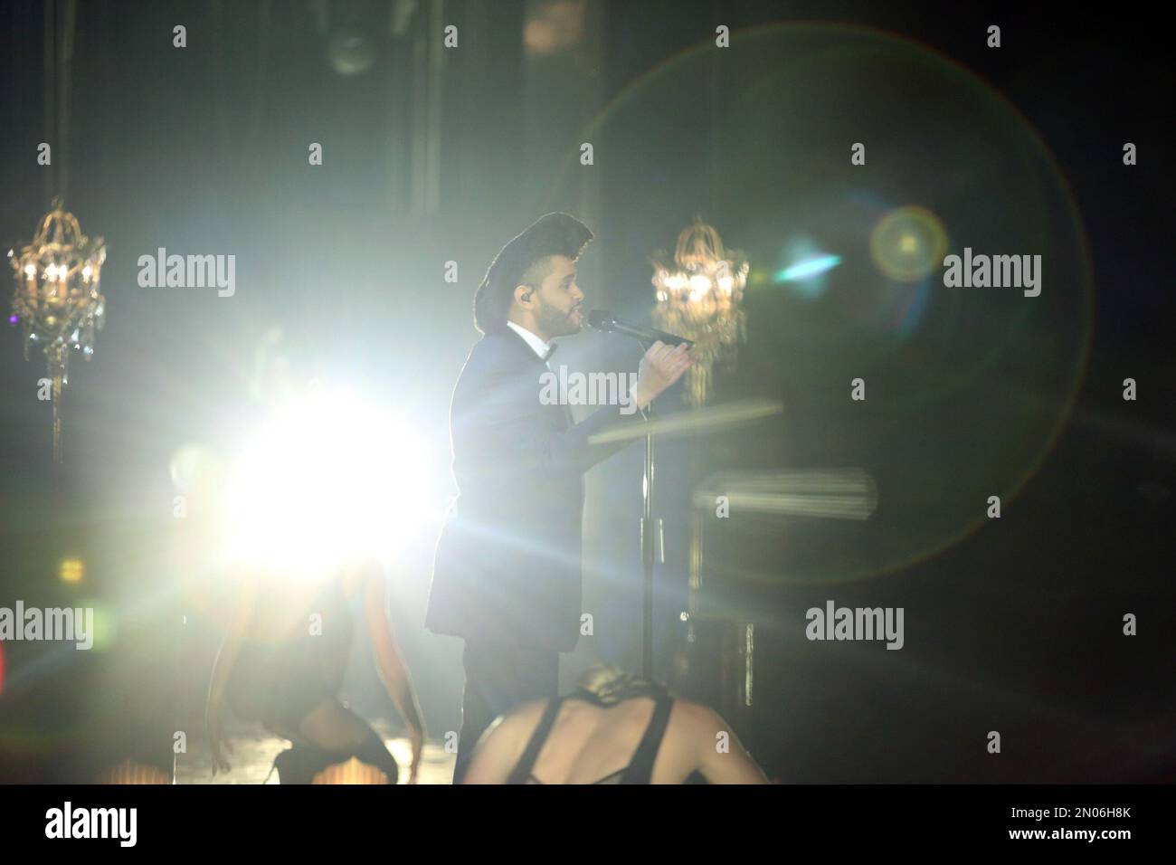 The Weeknd is seen from backstage as he performs his nominated song ...