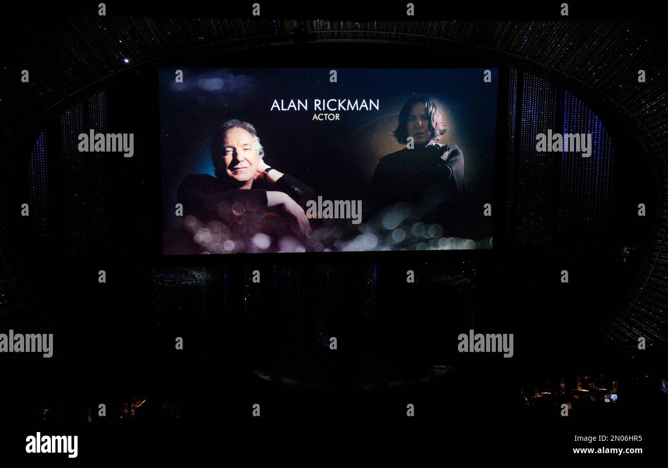 Alan Rickman is featured on screen during the in memoriam tribute at ...