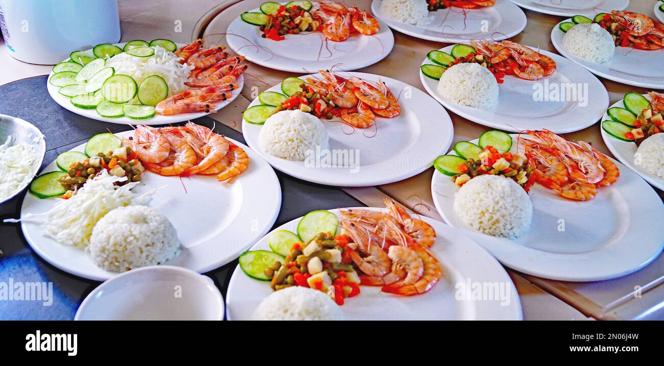 plates of food on board a catamaran in Cayo Santa María in Republic of ...
