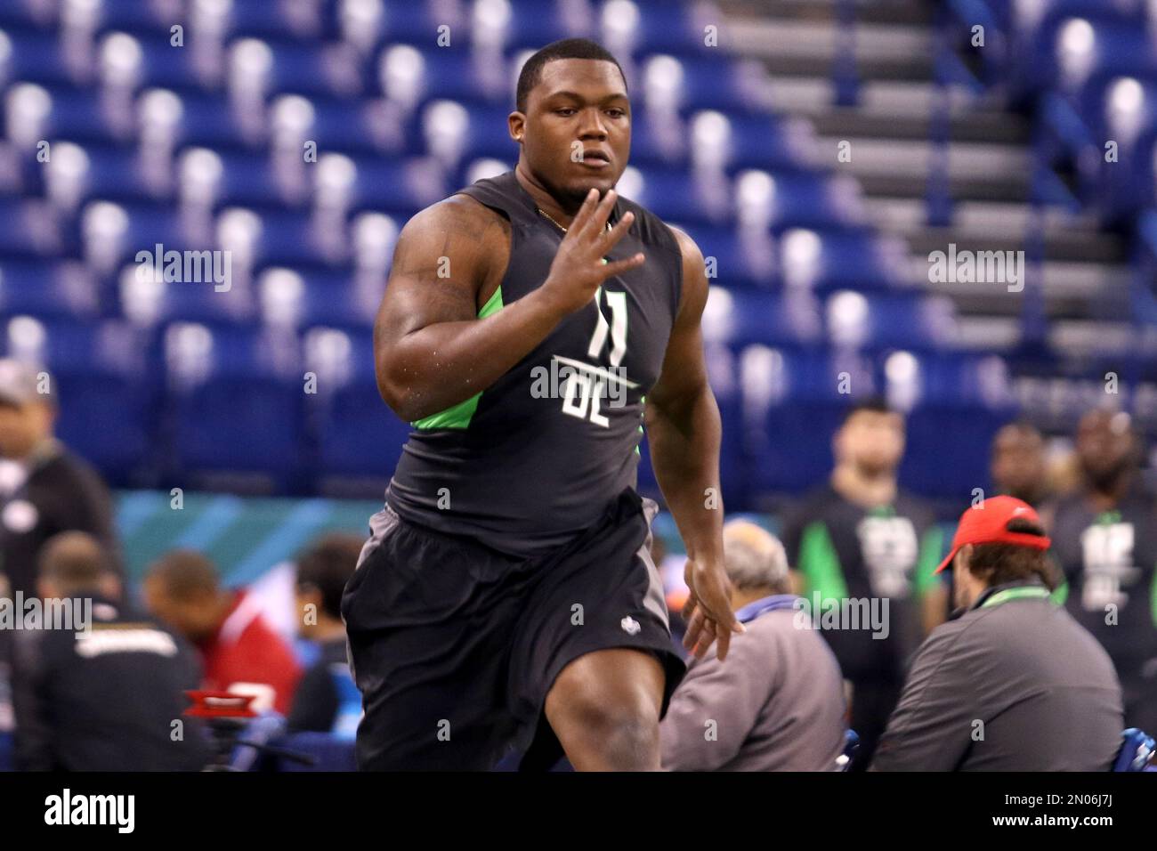 UCLA defensive lineman Kenny Clark competes in the 40 yard dash at the ...