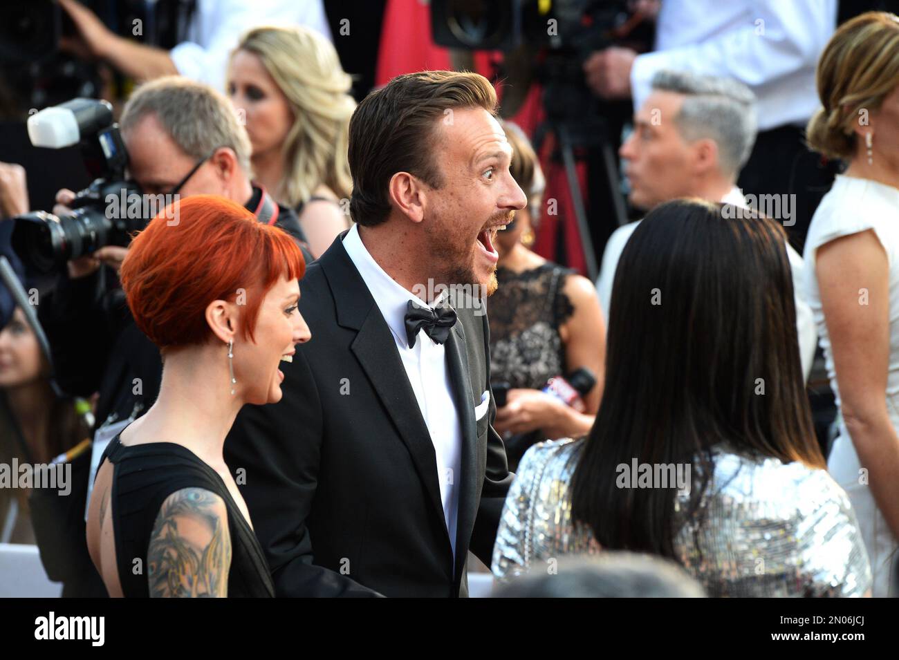 Alexis Minter, left, and Jason Segel arrive at the Oscars on Sunday ...