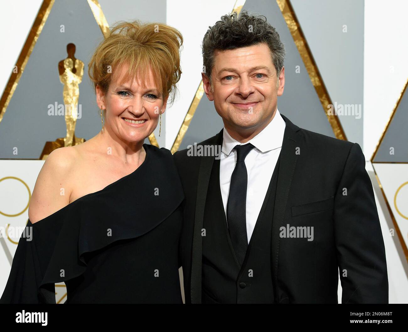Lorraine Ashbourne, left, and Andy Serkis arrive at the Oscars on ...