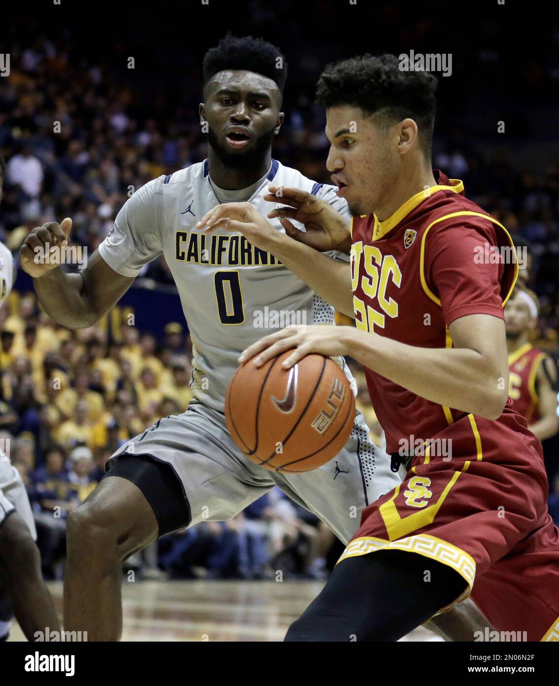 Southern California's Bennie Boatwright, right, drives the ball against ...