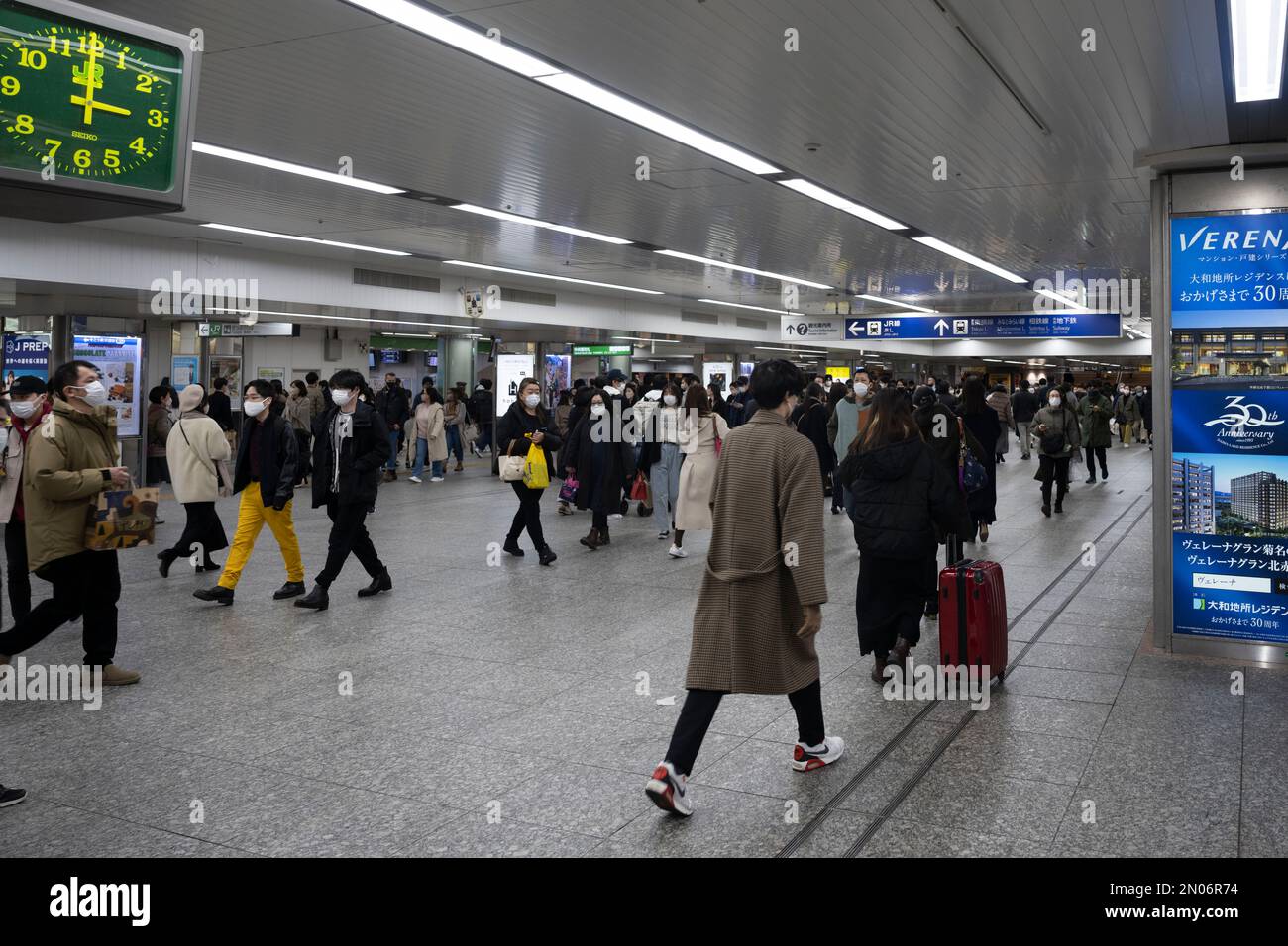 Yokohama, Kanagawa Prefecture, Japan. 5th Feb, 2023. Commuters walk ...