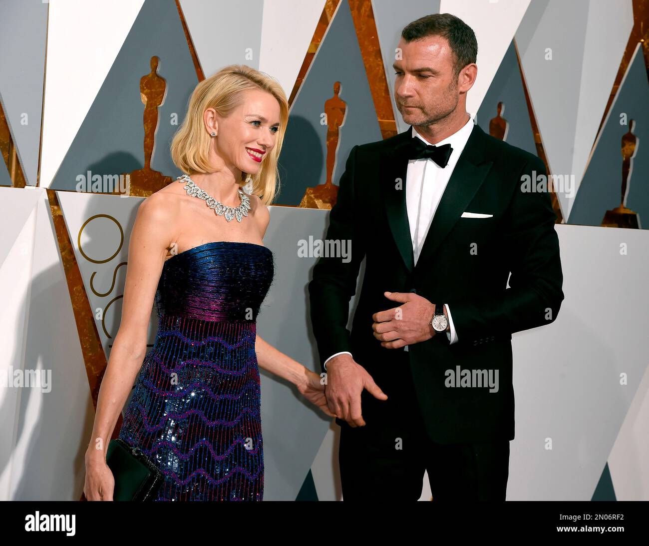 Naomi Watts, left, and Liev Schreiber arrive at the Oscars on Sunday ...