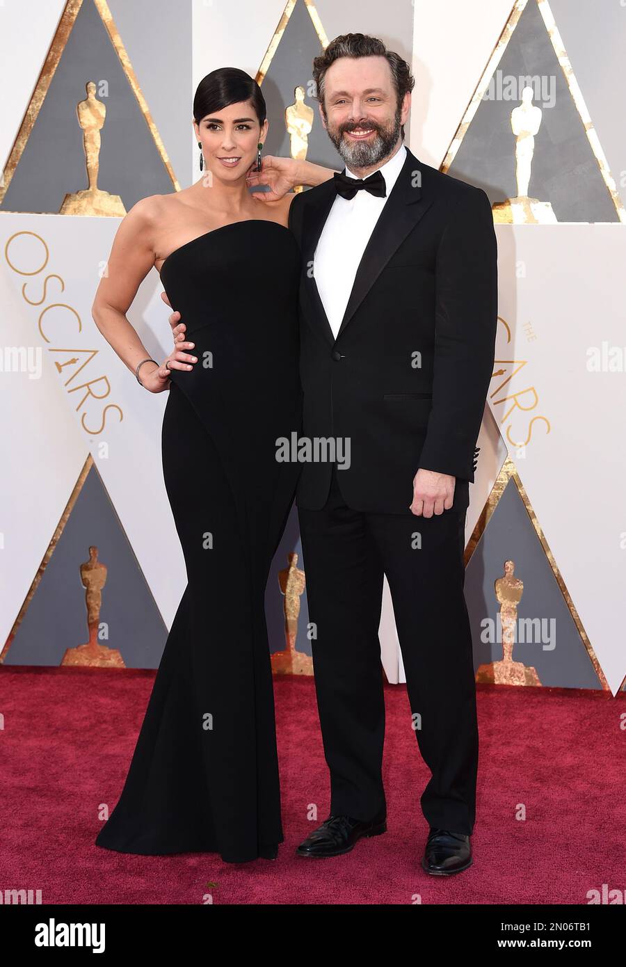 Sarah Silverman, left, and Michael Sheen arrive at the Oscars on Sunday ...