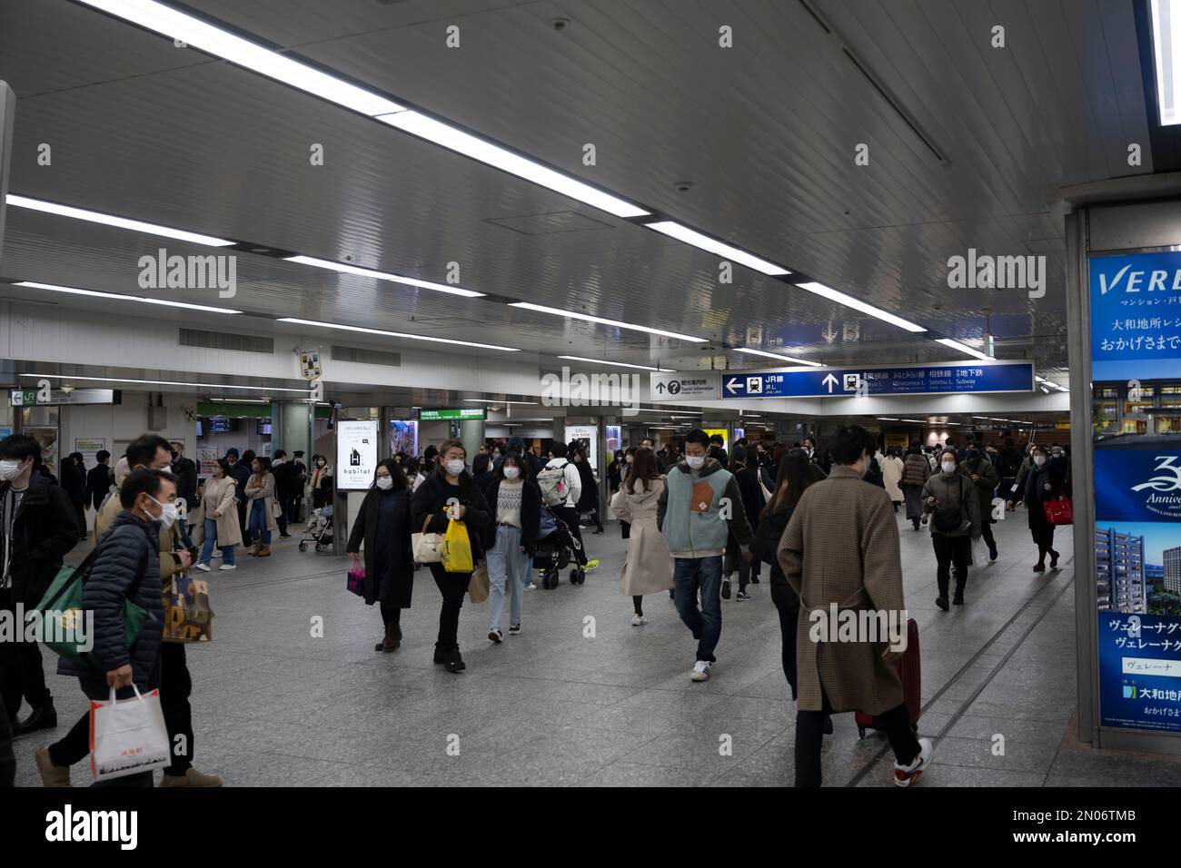 Yokohama, Kanagawa Prefecture, Japan. 5th Feb, 2023. Commuters walk ...