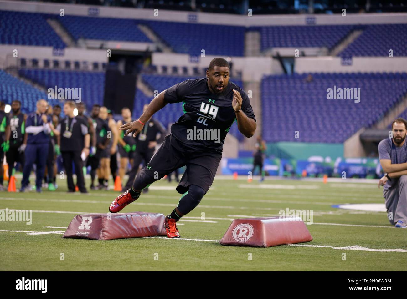 Louisville defensive lineman Sheldon Rankins runs a drill at the NFL ...