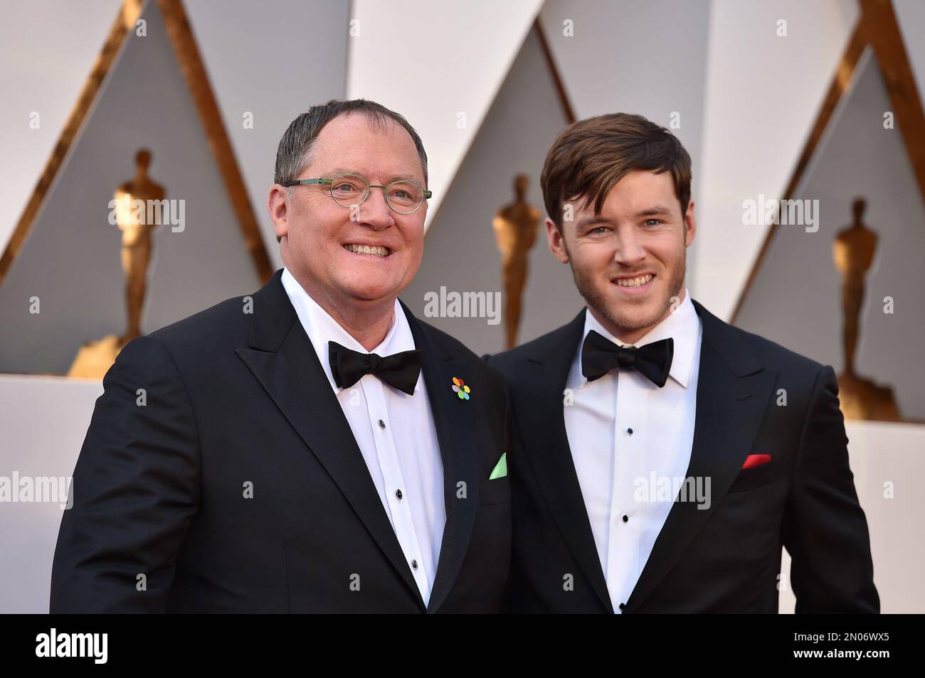 John Lasseter, left, and Paul James Lasseter arrive at the Oscars on ...
