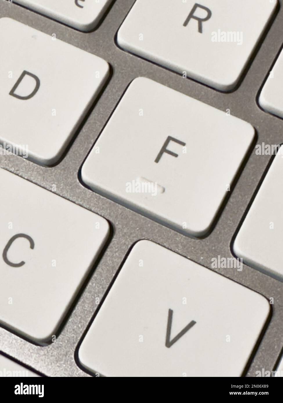 Wireless Apple Mac keyboard, close-up, detail, letters Stock Photo - Alamy