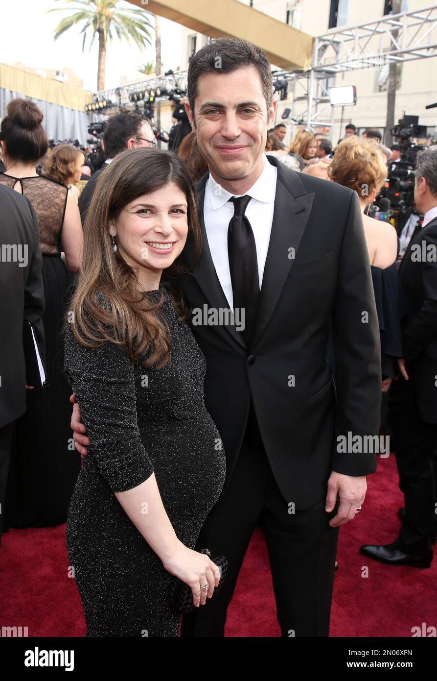 Laura Dave, left, and Josh Singer arrive at the Oscars on Sunday, Feb ...