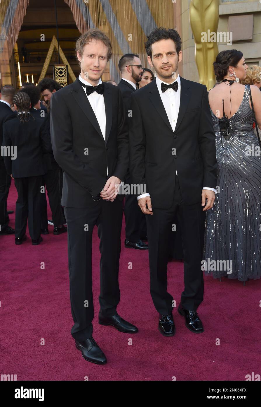 Laszlo Nemes, left, and Geza Rohrig arrive at the Oscars on Sunday, Feb ...