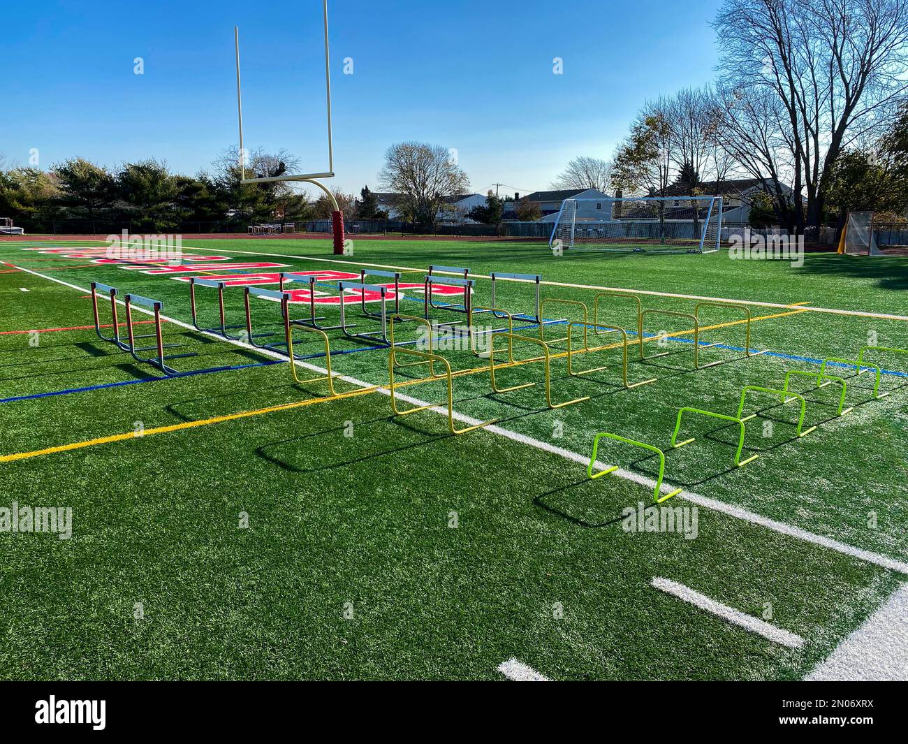 Different kinds of Hurdles set up on a field for strength and agility practice Stock Photo - Alamy