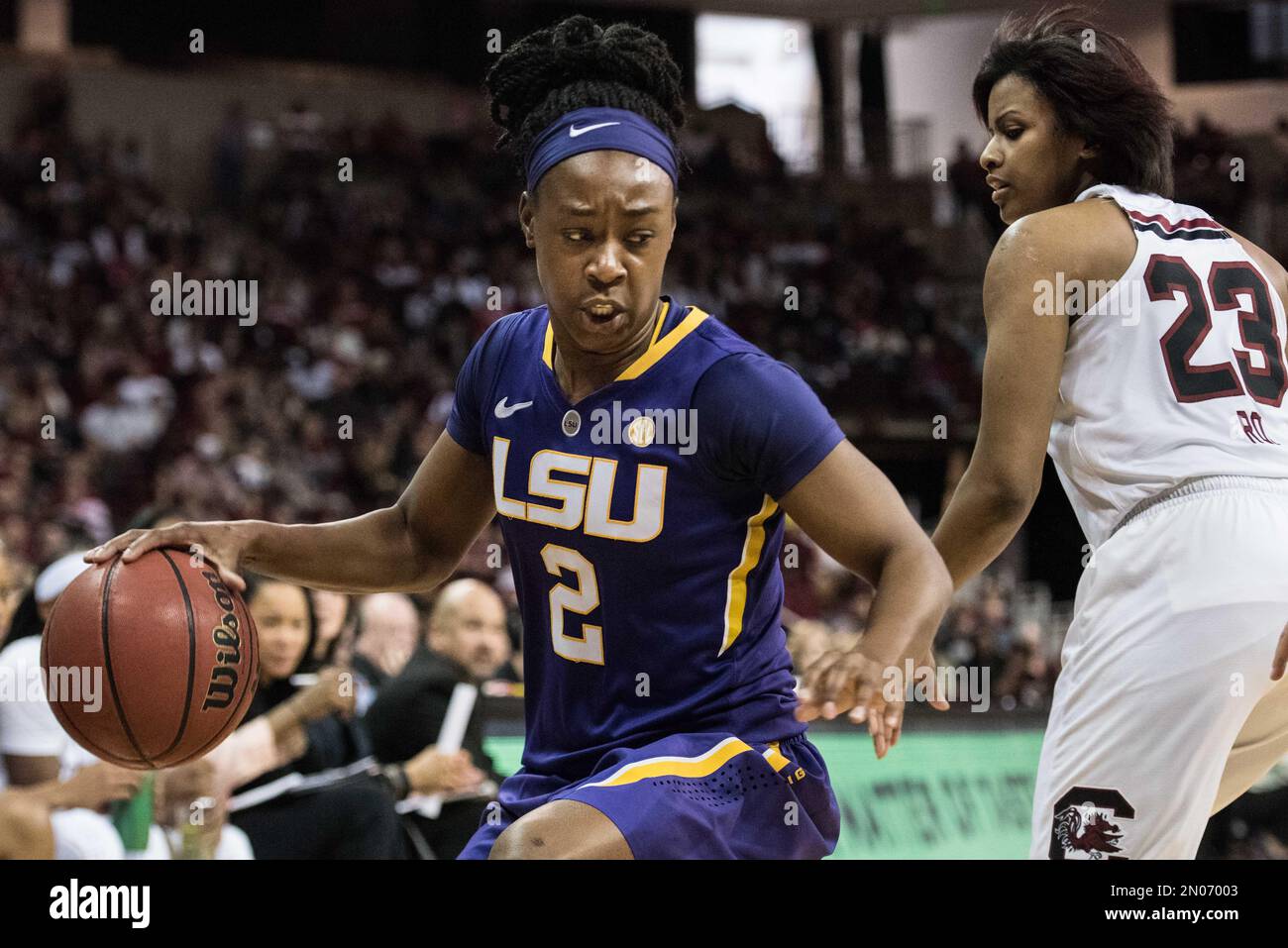 LSU guard Shanice Norton, left, dribbles around South Carolina guard ...