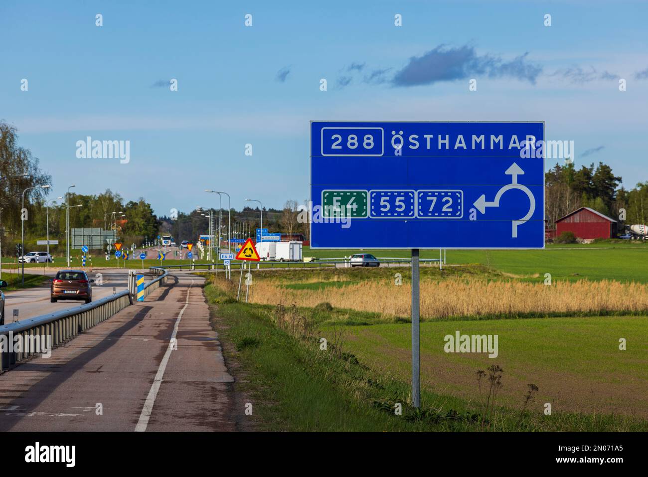 Close up view of motorway with road billboard with screen. Sweden ...