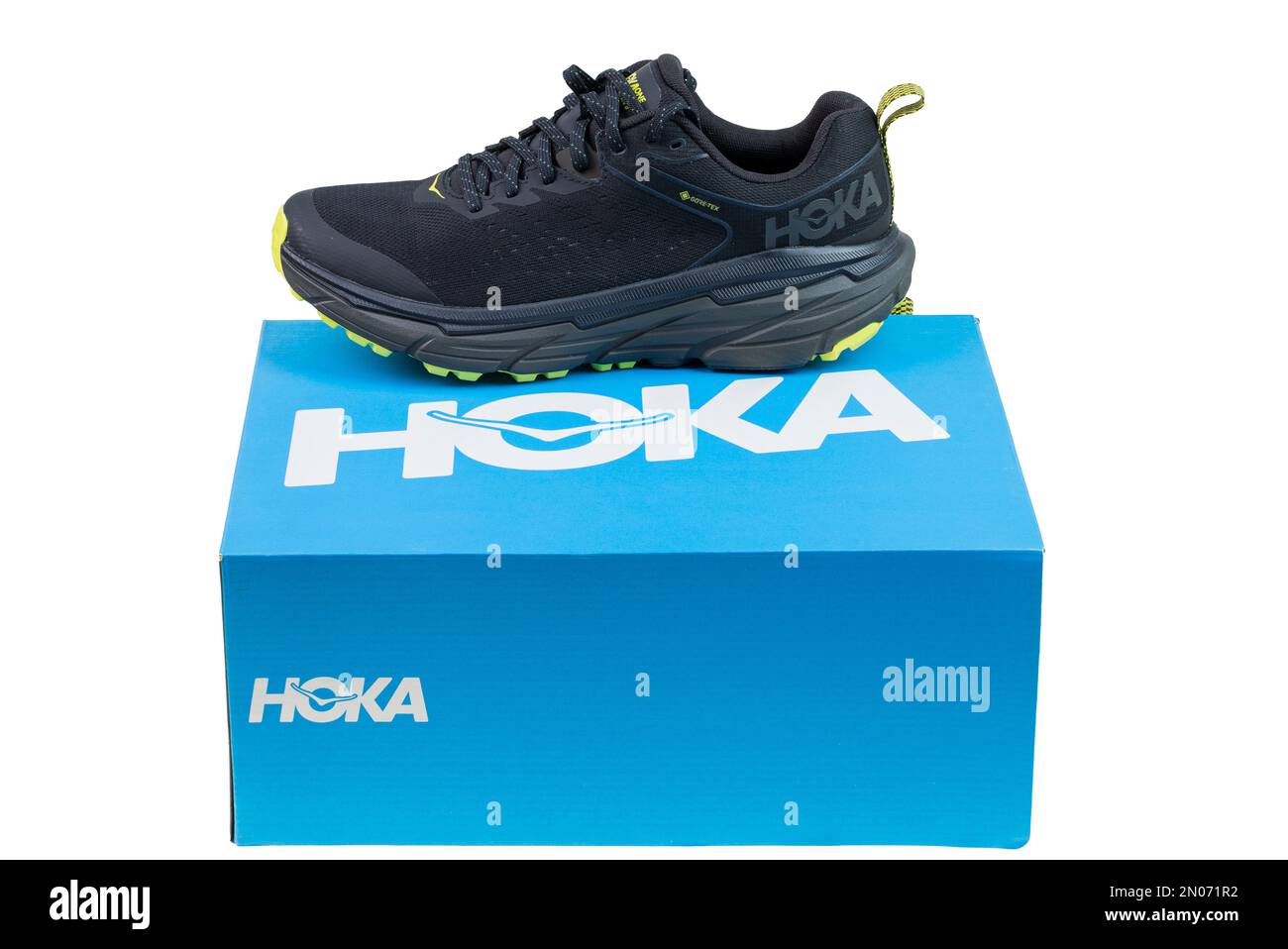 Close-up view of Hoka sneakers in carton box isolated on white ...