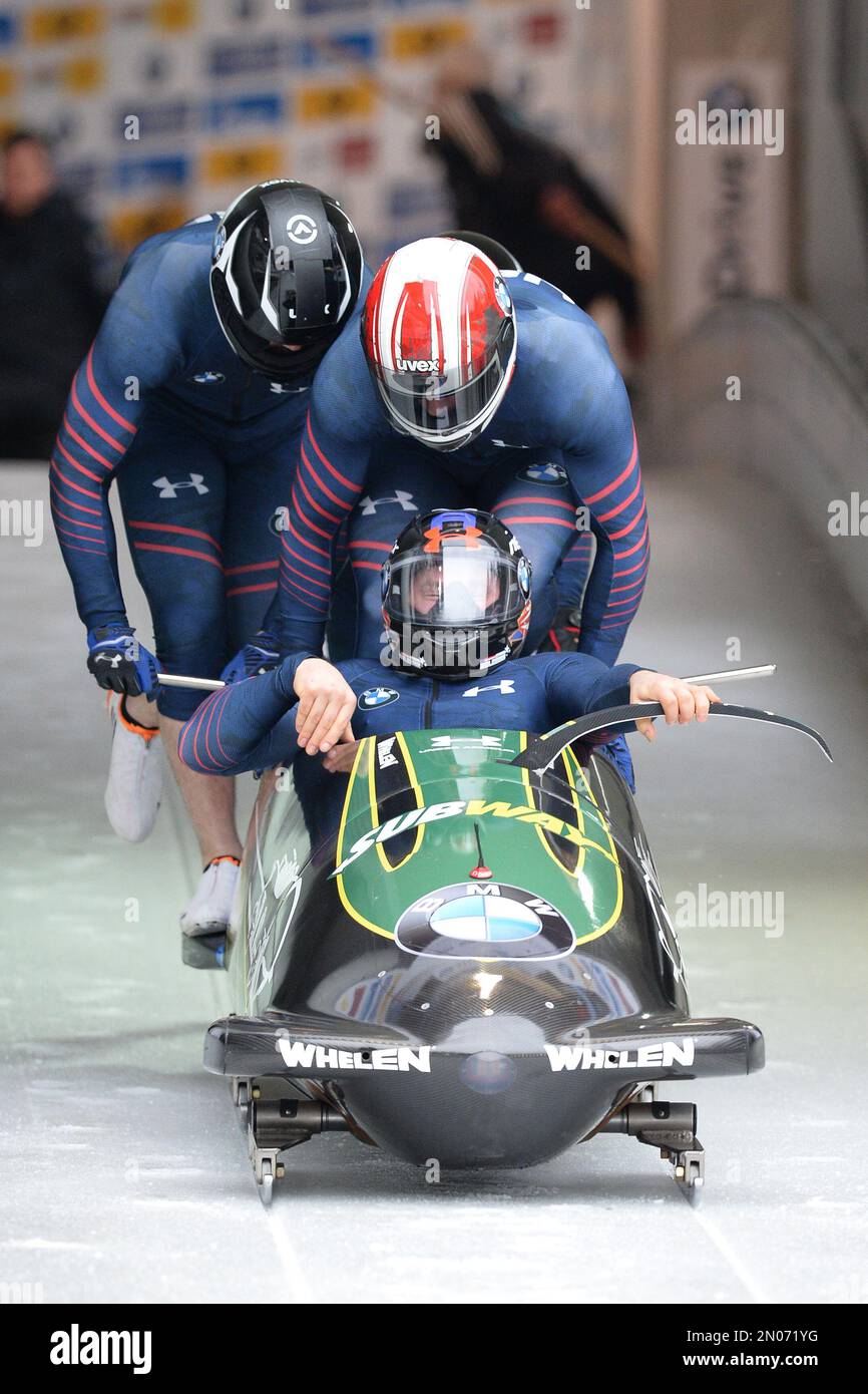 Unites States' driver Steven Holcomb, front, and his pushers Frank ...