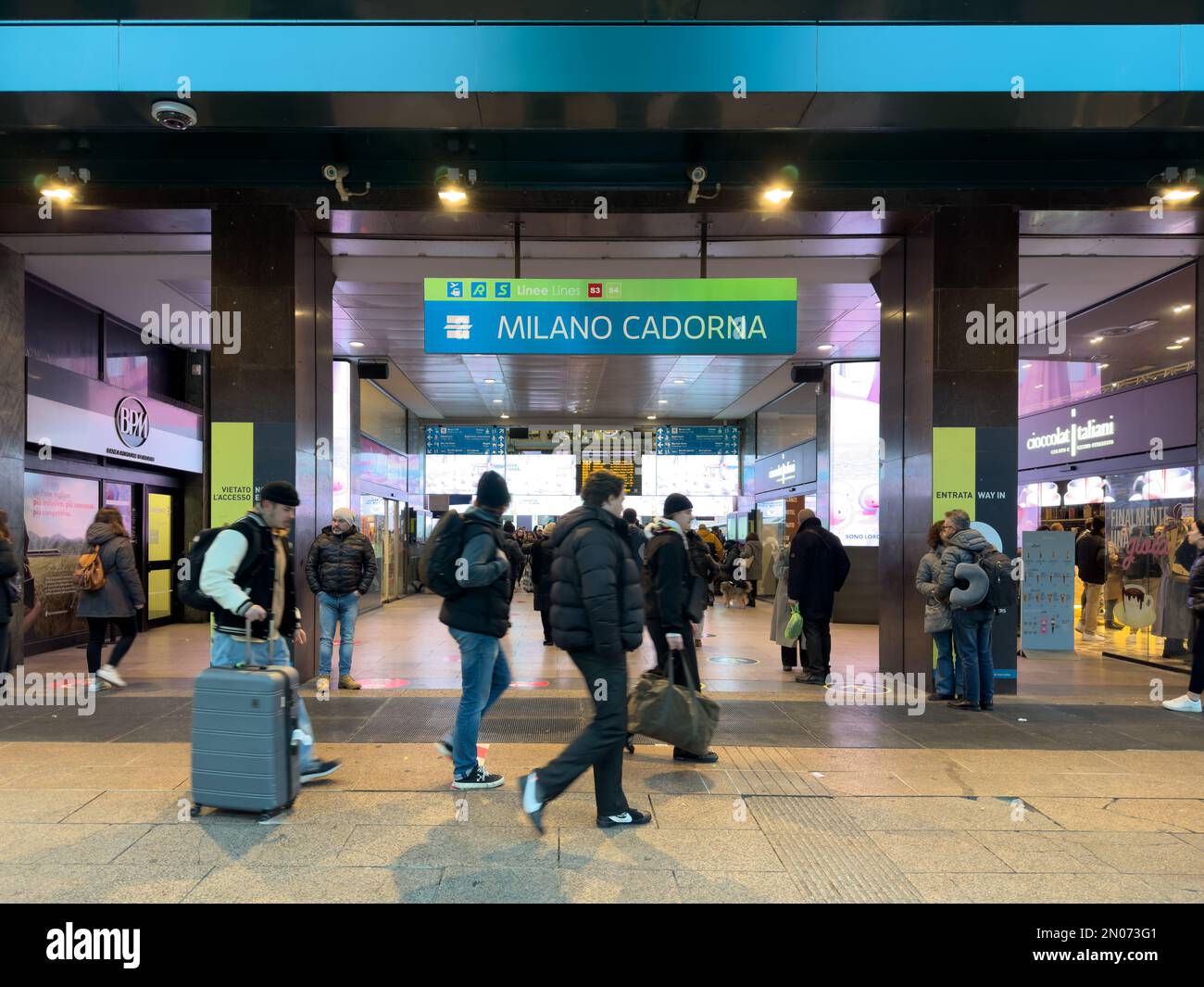 a fantastic view inside Milan's Cadorna Train station with commuters and tourists, Milan, Italy ...