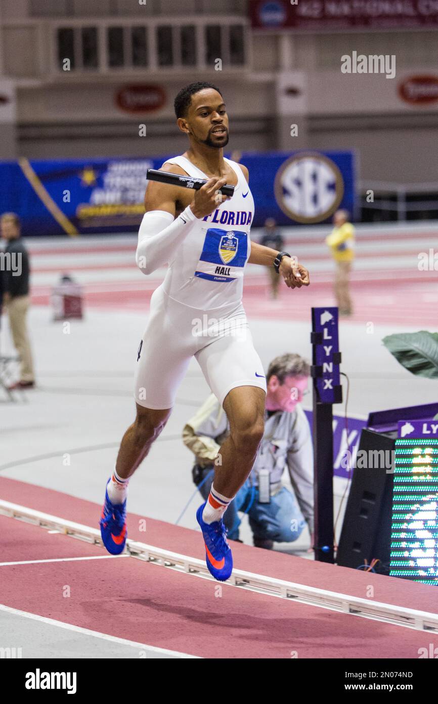 Florida's Arman Hall crosses the finish line to win the men's 1,600 ...
