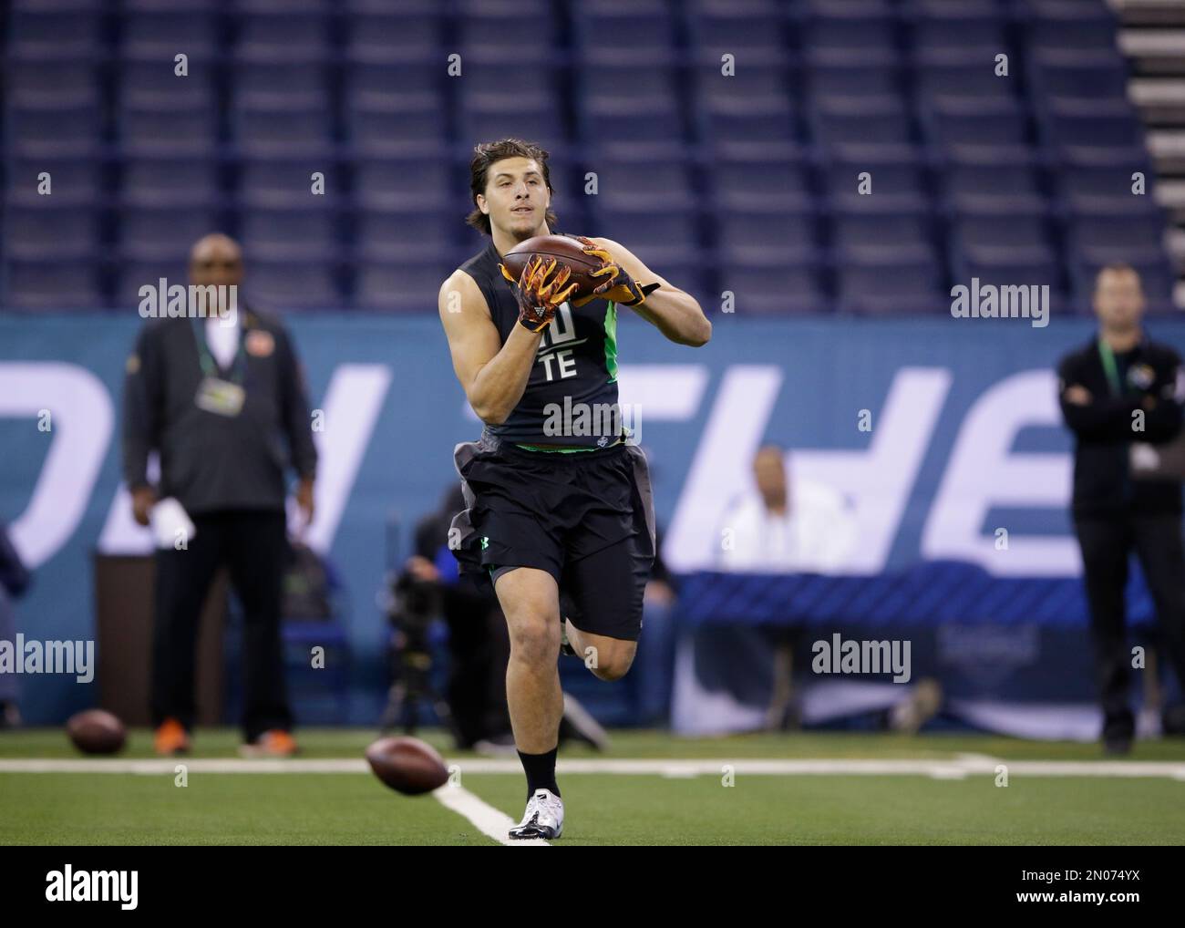 Stanford tight end Austin Hooper runs a drill at the NFL football ... Stanford tight end Austin Hooper runs a drill at the NFL football ...