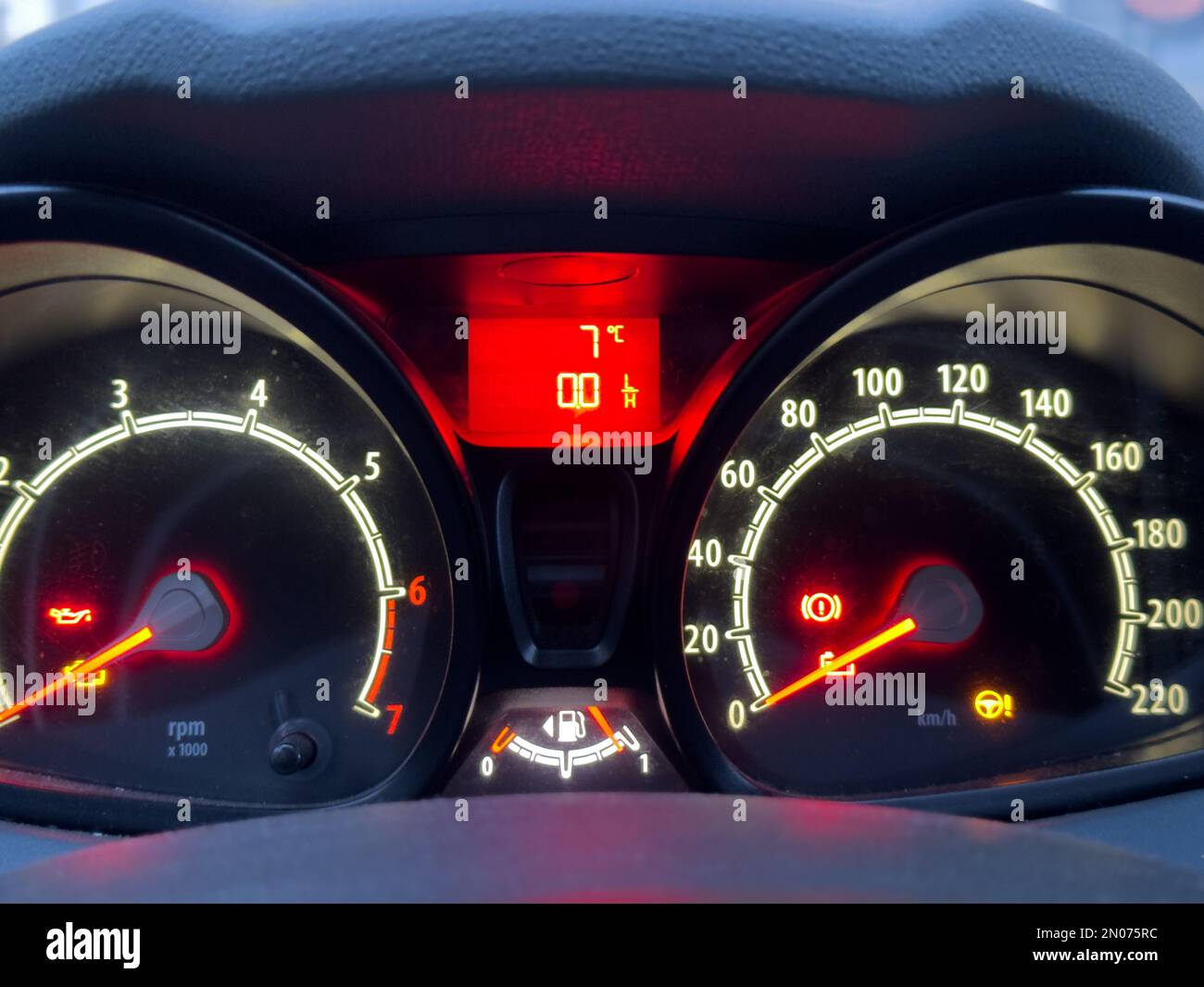 an interesting photograph of a illuminated car dashboard Stock Photo ...