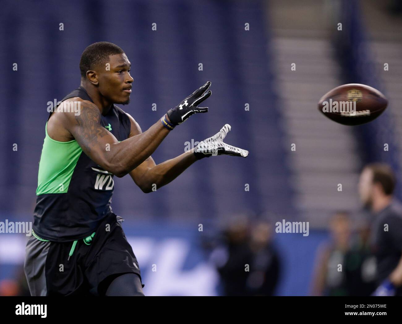 Toledo receiver Alonzo Russell runs a drill at the NFL football ...