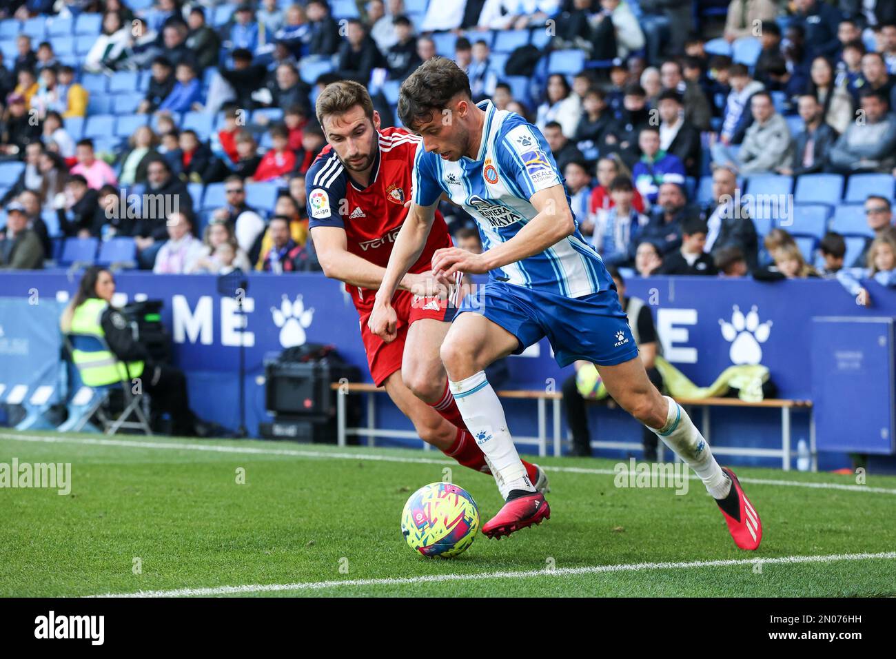 Javi Puado of RCD Espanyol in action with Jon Moncayola of CA Osasuna ...