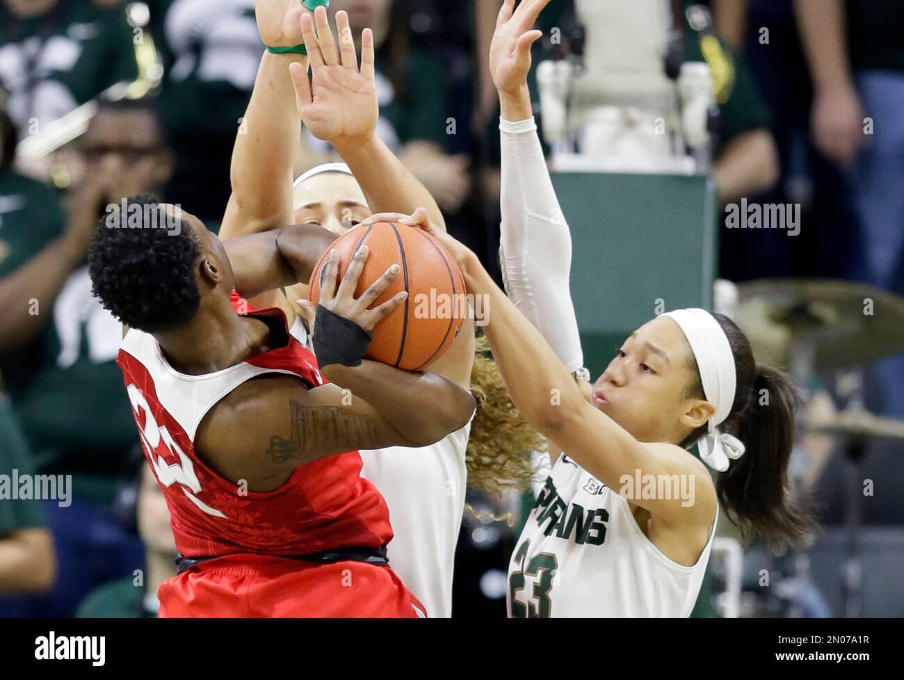 Ohio State forward Alexa Hart (22) is fouled by Michigan State forward ...