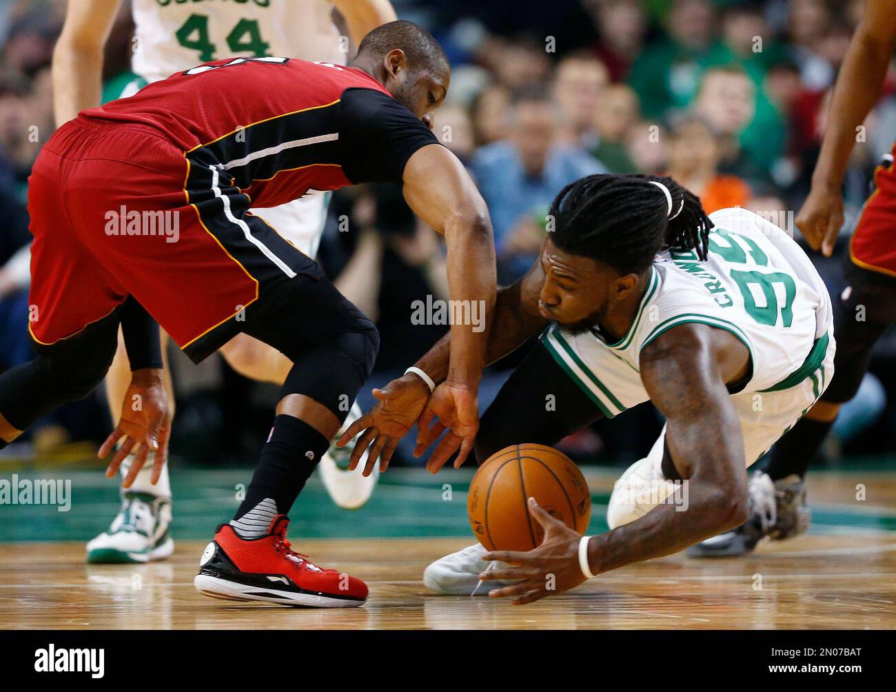 Boston Celtics' Jae Crowder (99) gets a loose ball away from Miami Heat ...