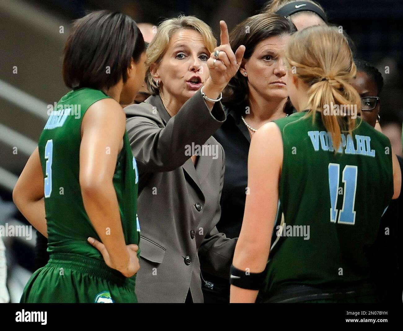 Tulane head coach Lisa Stockton, center, talks to players Kolby Morgan ...