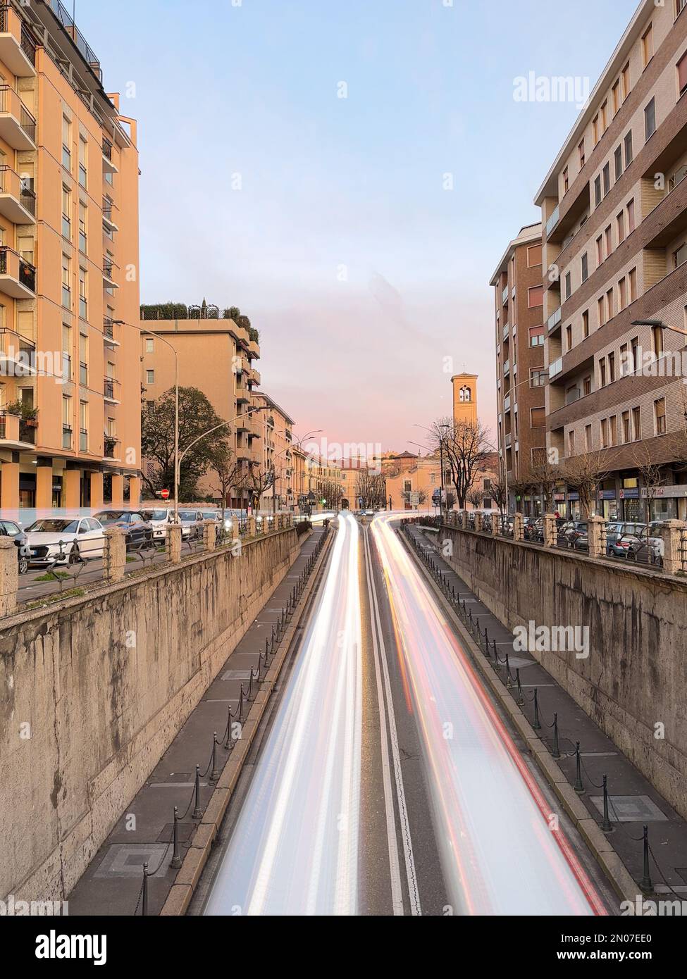 an amazing photograph of a bridge and it's underpass, with cars and ...