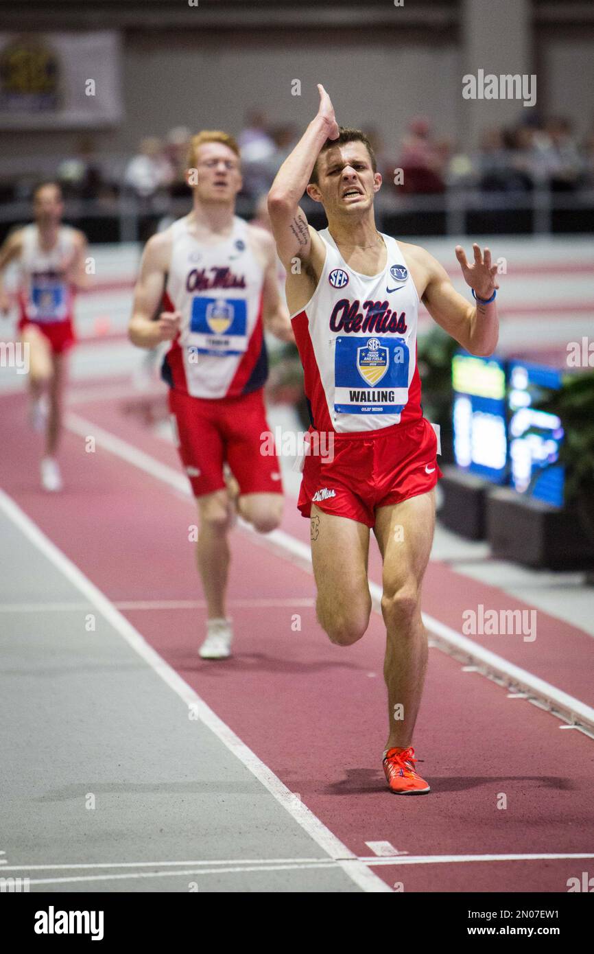 Ole Miss' Ryan Walling, right, gestures in celebration as he prepares ...
