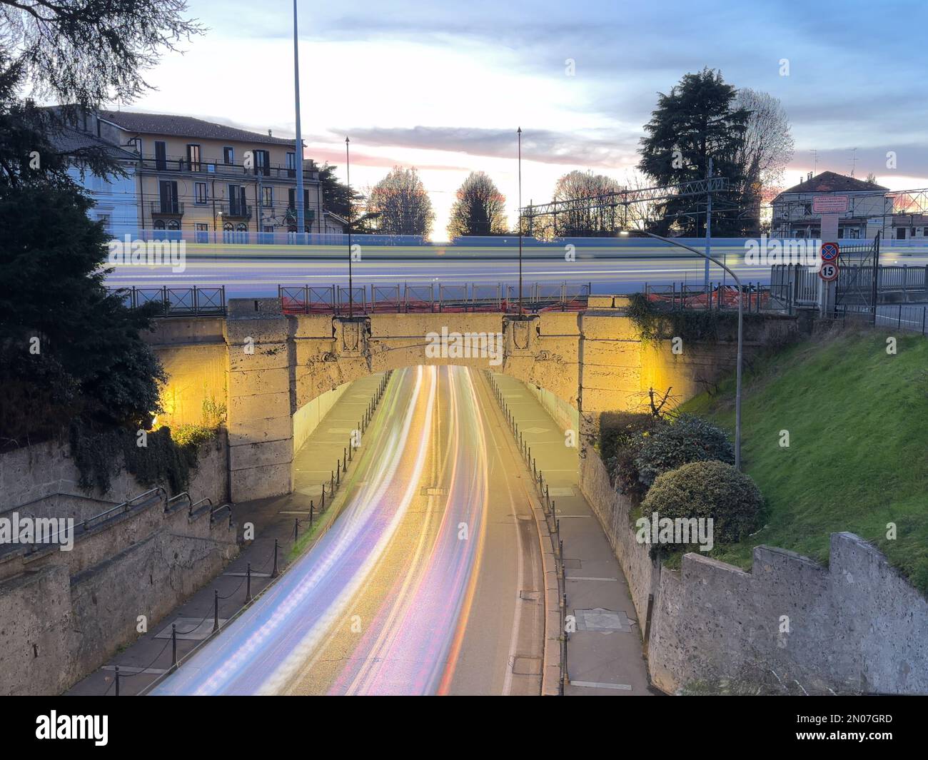 an amazing photograph of a bridge and it's underpass, with cars and ...