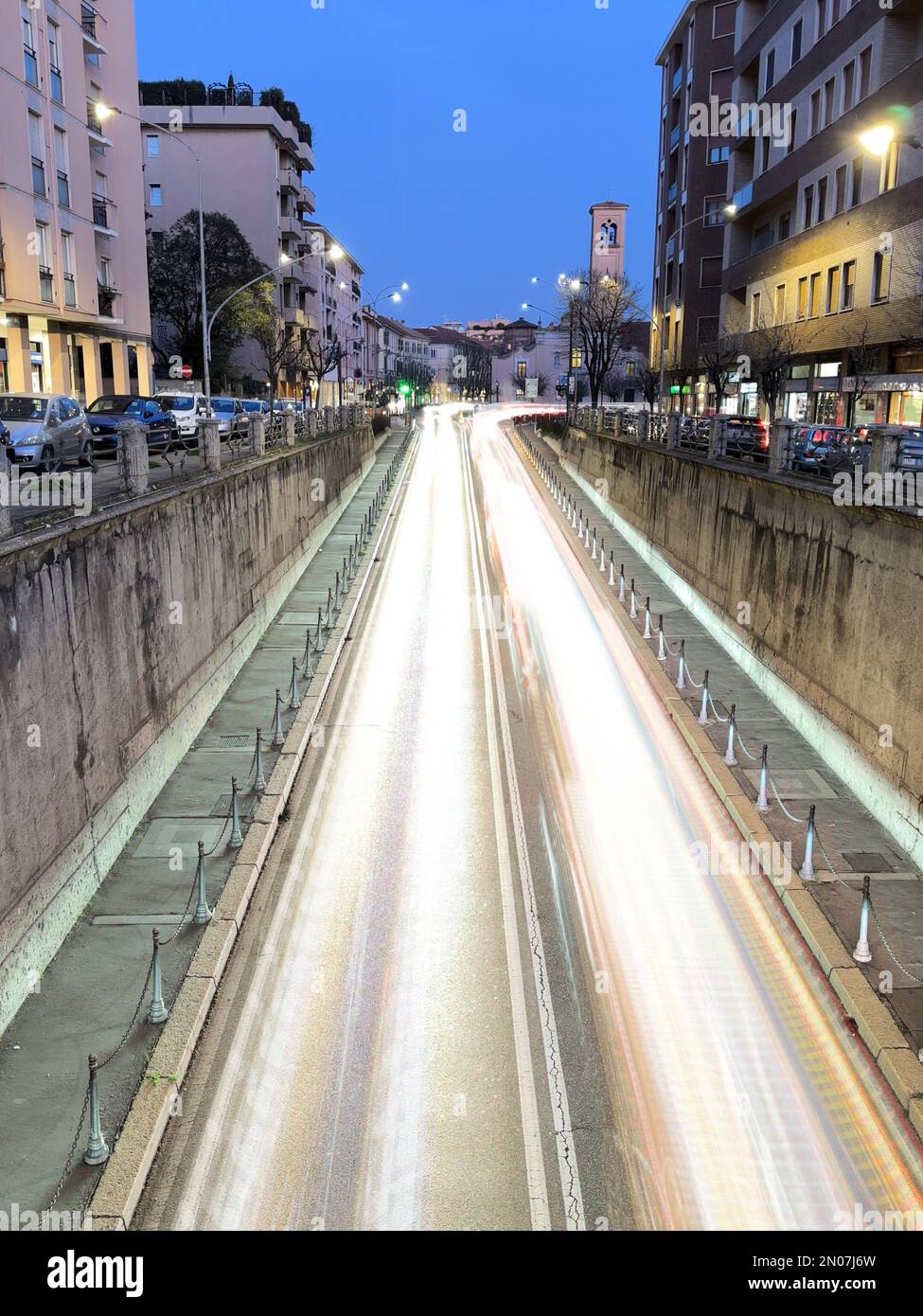 an amazing photograph of a bridge and it's underpass, with cars and ...