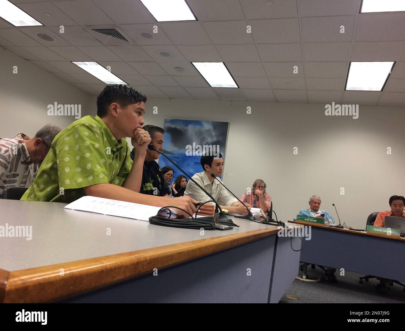 Hawaii Tourism Authority Chief Operating Officer Randy Baldemor, left ...