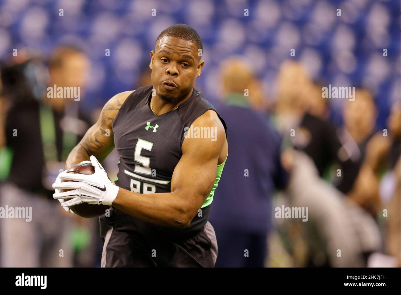Illinois State running back Marshaun Coprich runs a drill at the NFL ...